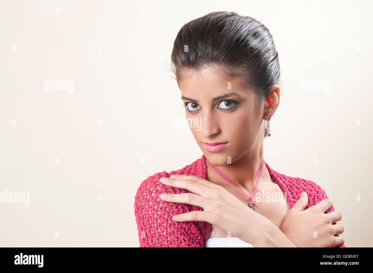 Beautiful young woman hands on shoulders Stock Photo - Alamy