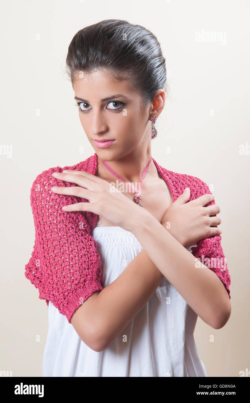 Beautiful young woman hands on shoulders Stock Photo - Alamy