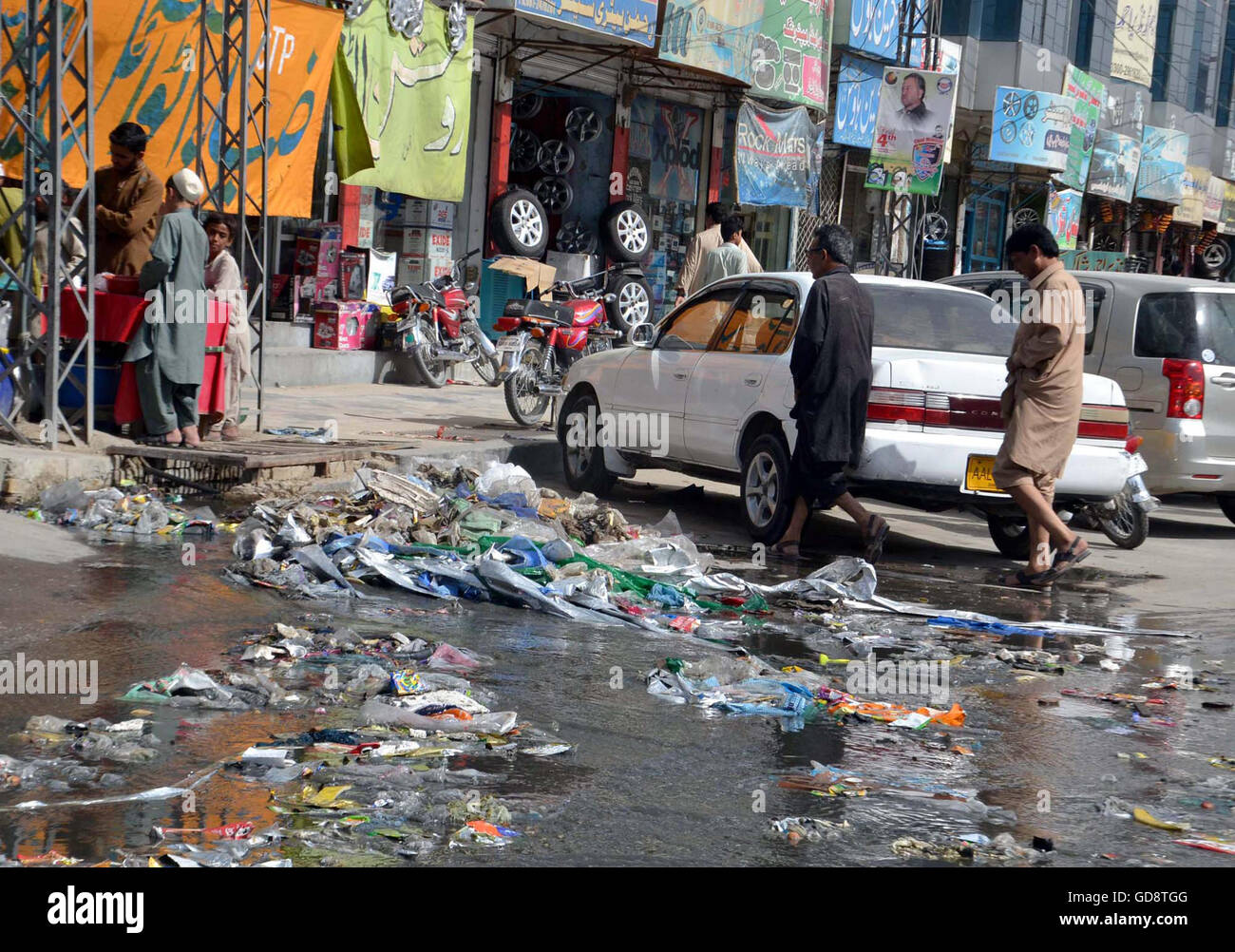 Flow of sewerage water on road and heap of garbage creating problems ...