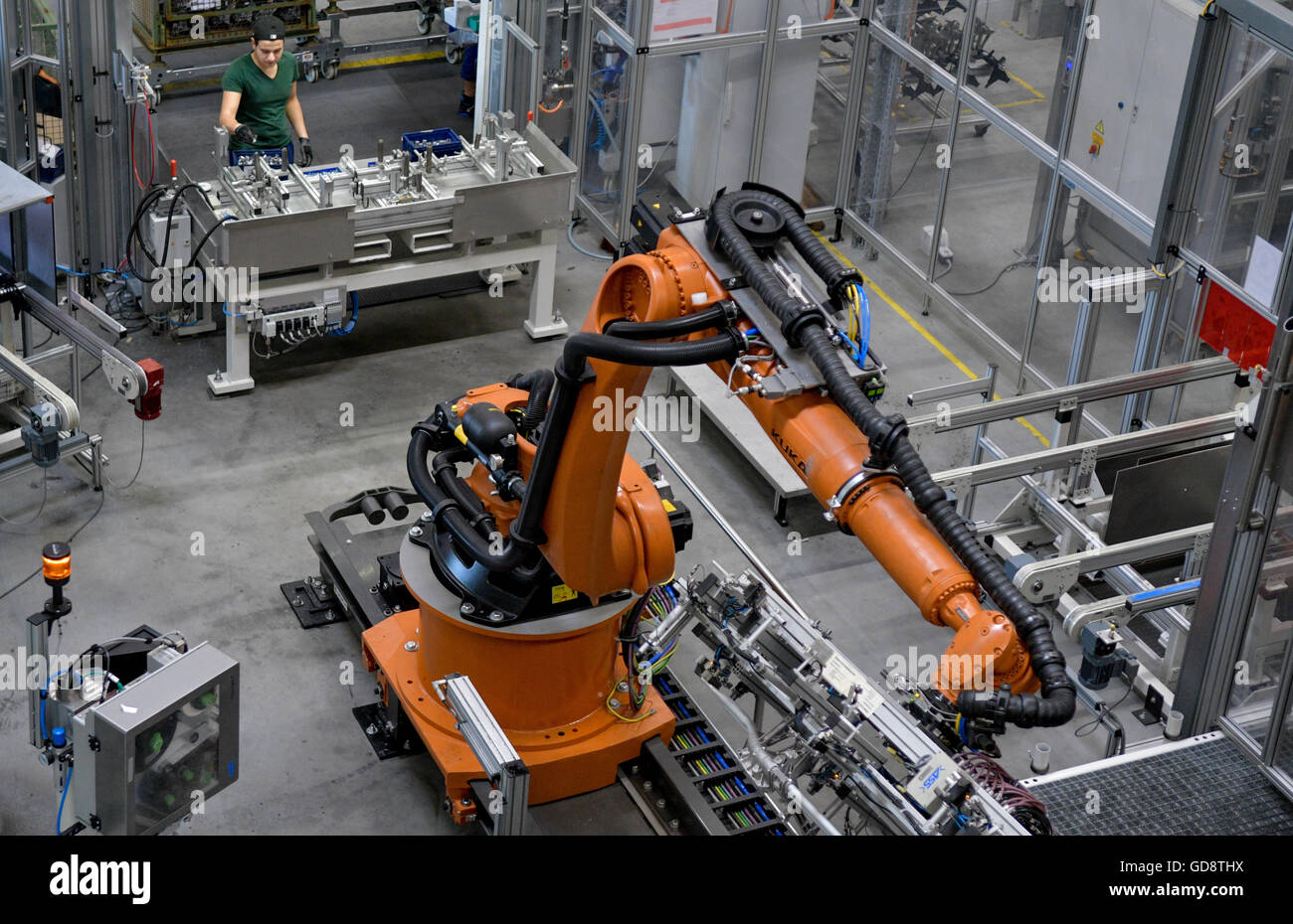 Hamburg, Germany. 13th July, 2016. A technician steers a industrial ...