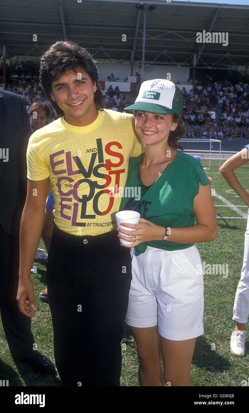 Oct. 13, 2005 - JOHN STAMOS WITH EMMA SAMMS 1980'S. © © Roger Karnbad ...