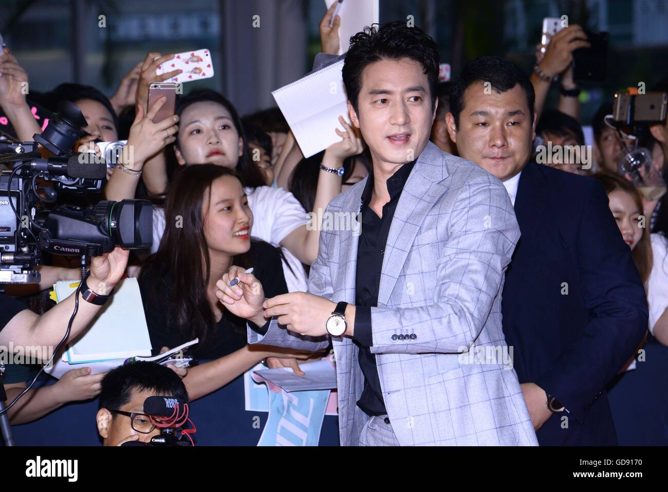 Seoul, Korea. 13th July, 2016. Jung-jae Lee and Liam Neeson attend the ...