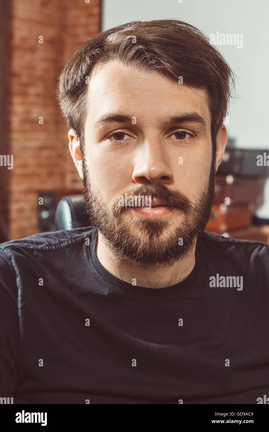 The young man looking at camera Stock Photo - Alamy