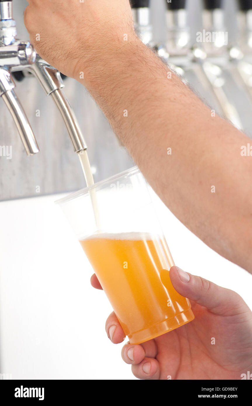 Man Filling a Glass of Beer Stock Photo - Alamy