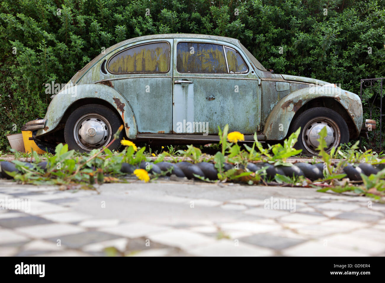 Side view of a derelict blue Volkswagen Beetle Stock Photo - Alamy