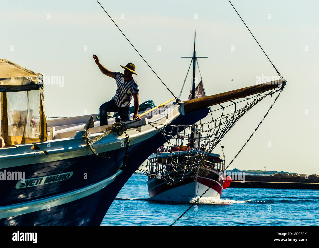 Mate guiding boat into port hi-res stock photography and images - Alamy