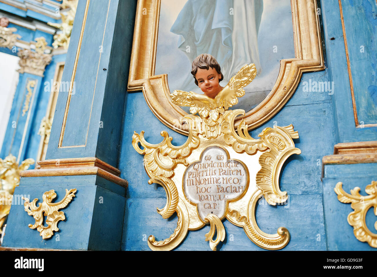Golden statue of head angel at iconostasis of church Stock Photo - Alamy