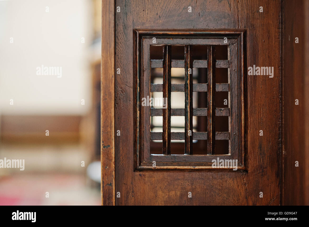 Wooden window of confessional box at church Stock Photo - Alamy