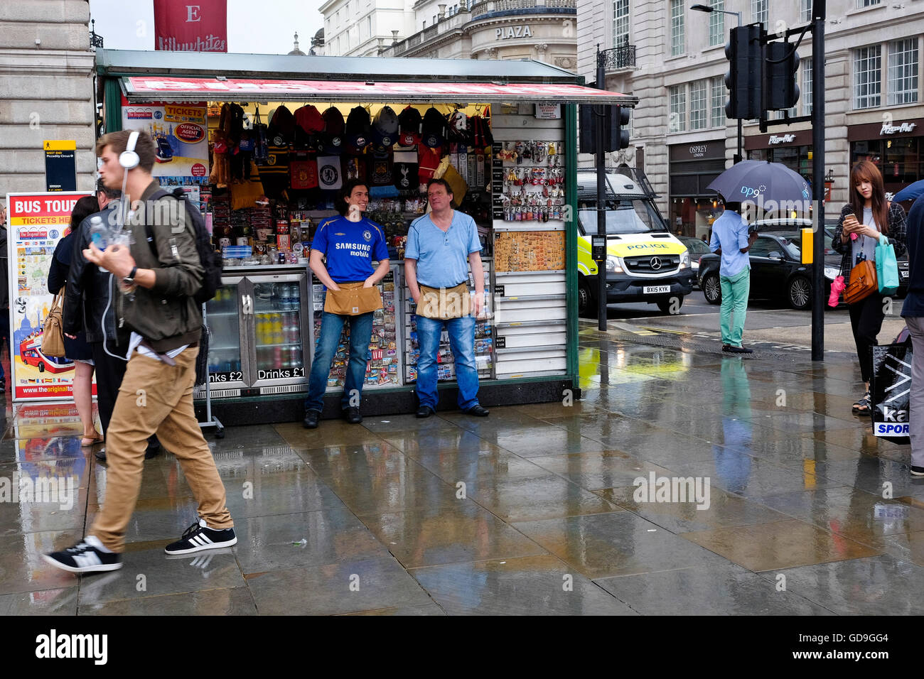London Piccadilly Circus. Street vendors selling stand next to their ...