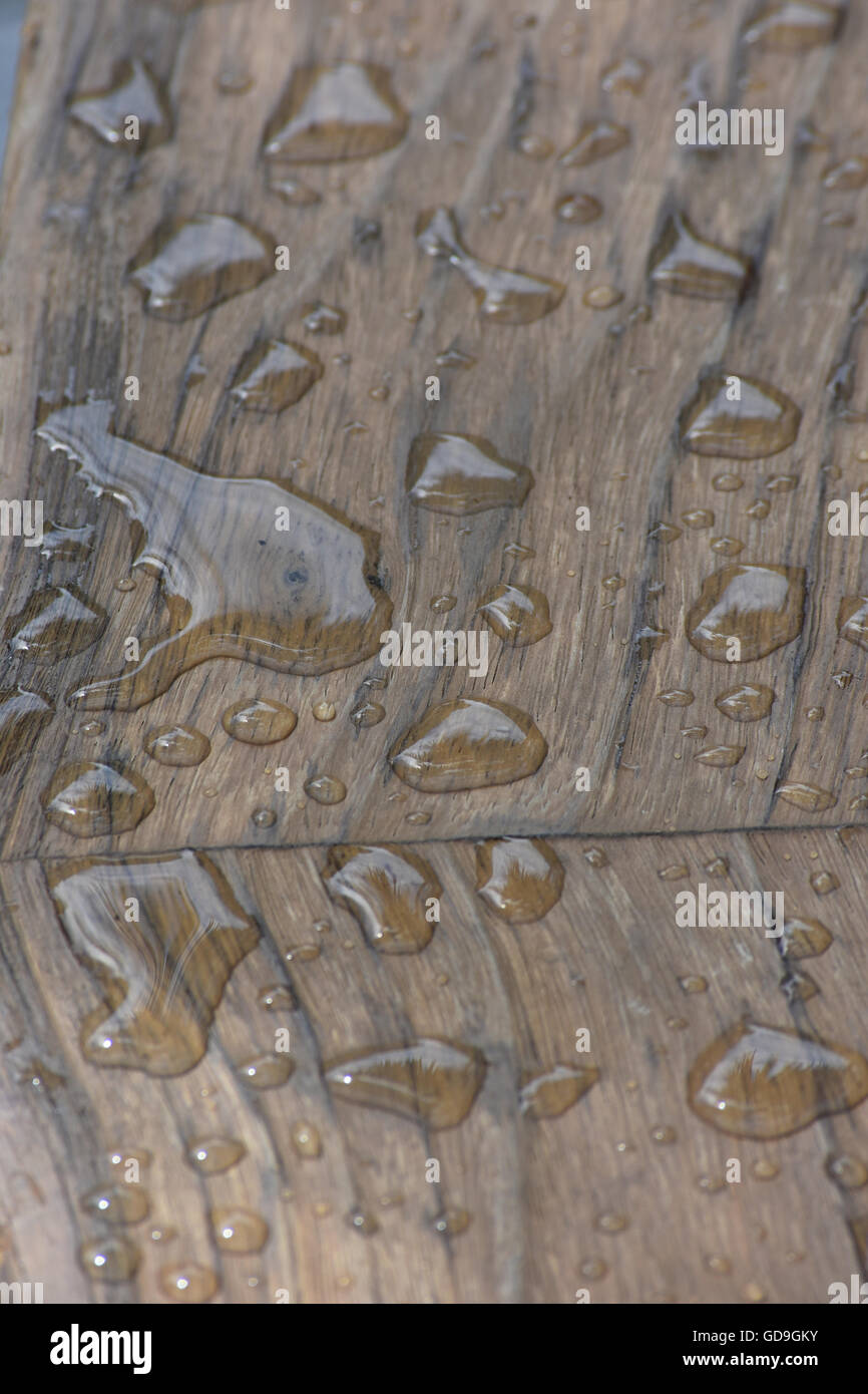 Drops of water on wood surface Stock Photo - Alamy