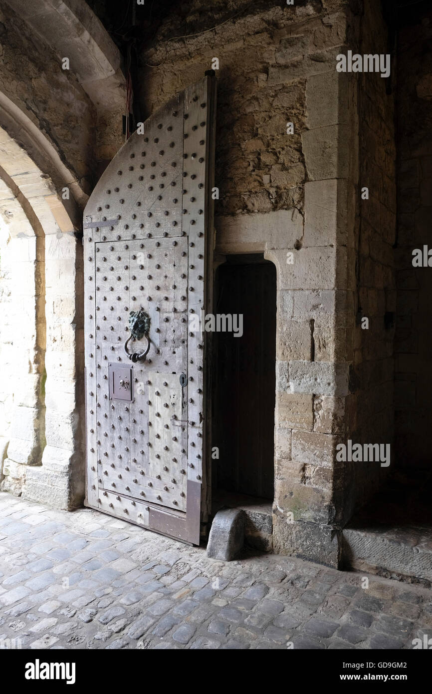 An ornately decorated reinforced door at Leeds Castle in Kent Stock ...