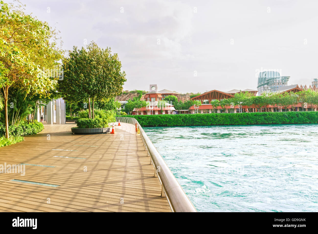 Tourists in Sentosa Boardwalk leading to Sentosa Island in Singapore ...