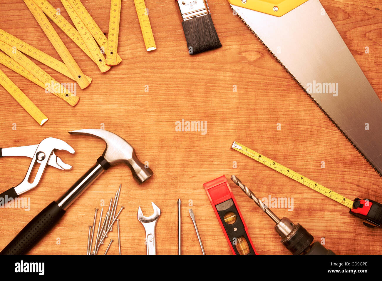 Assorted work tools on wood Stock Photo - Alamy