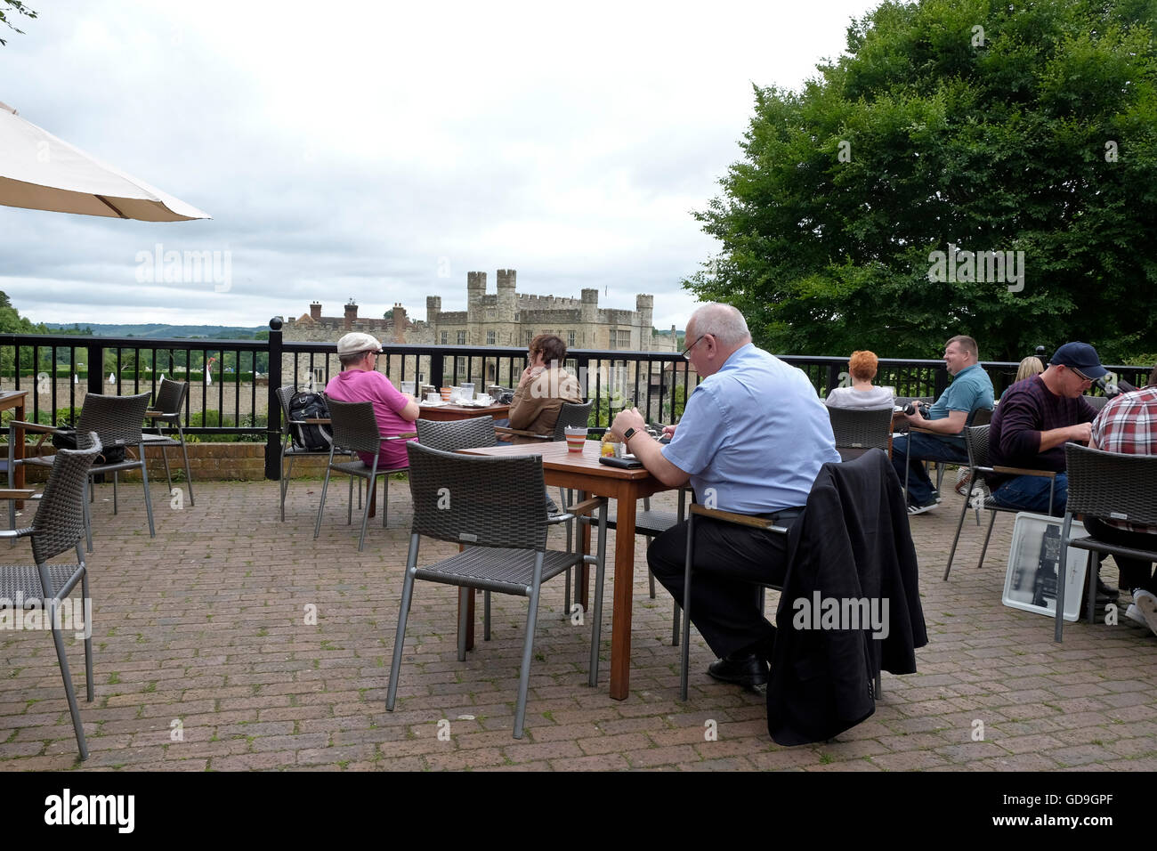 Visitors to Leeds Castle in Kent enjoy lunch on an area overlooking the ...