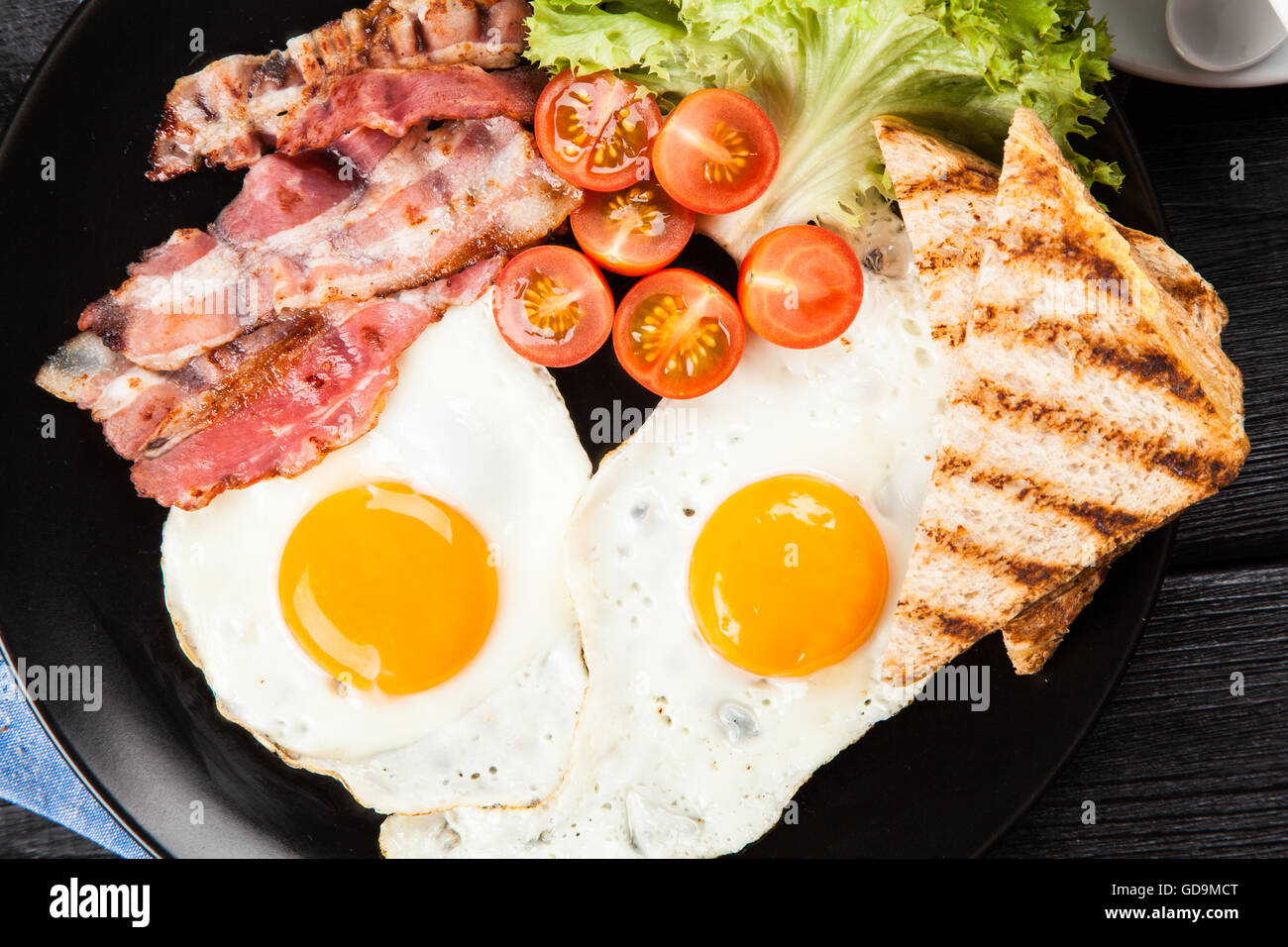 Traditional breakfast on a plate Stock Photo - Alamy