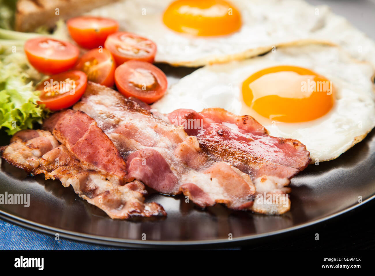Traditional breakfast on a plate Stock Photo - Alamy