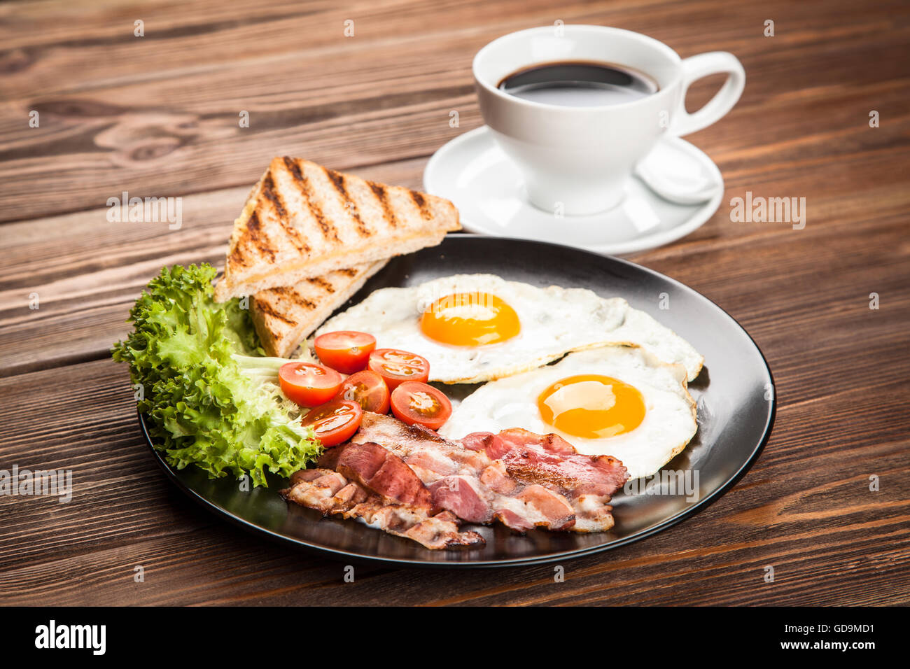 Traditional breakfast on a plate Stock Photo - Alamy