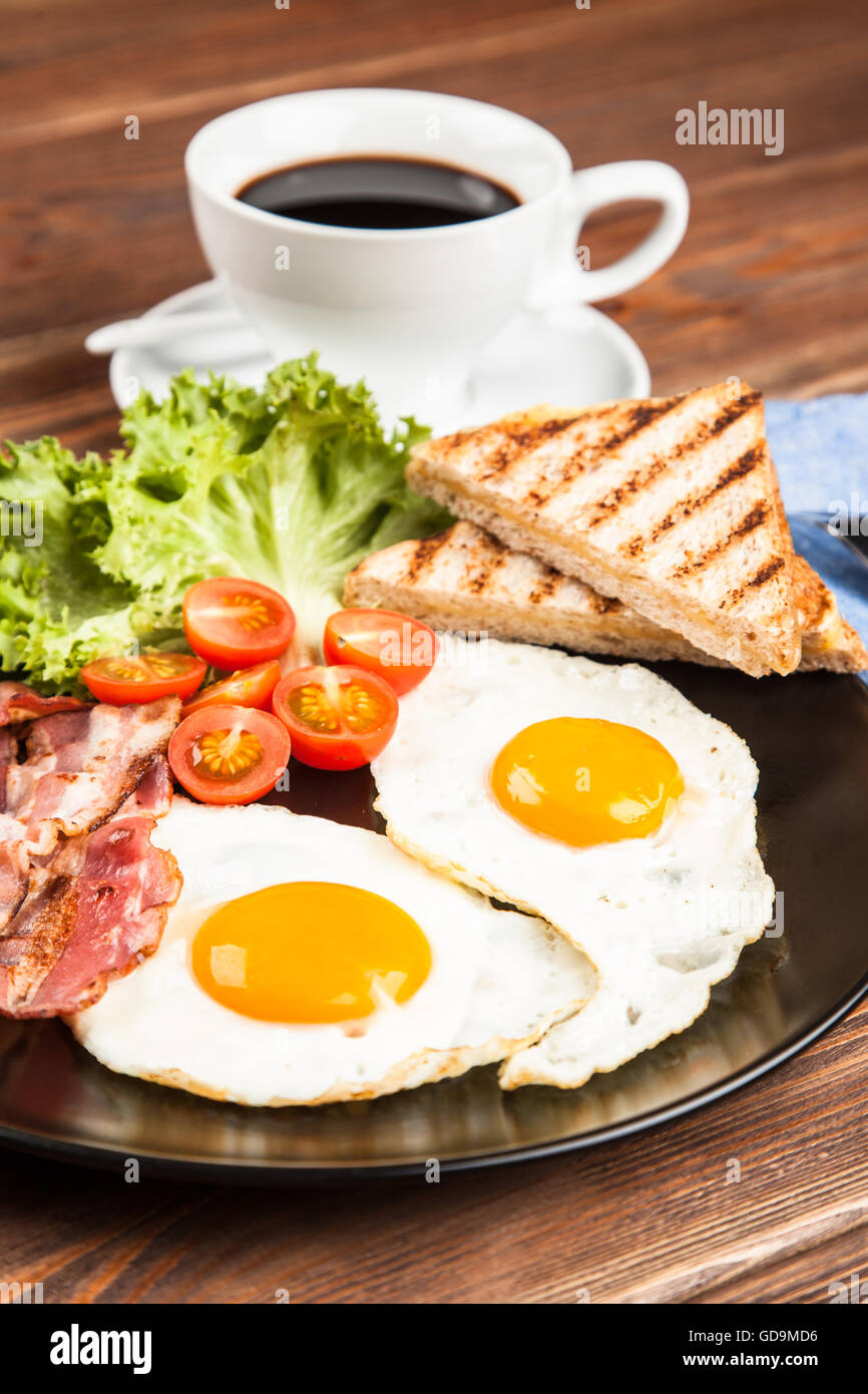 Traditional breakfast on a plate Stock Photo - Alamy