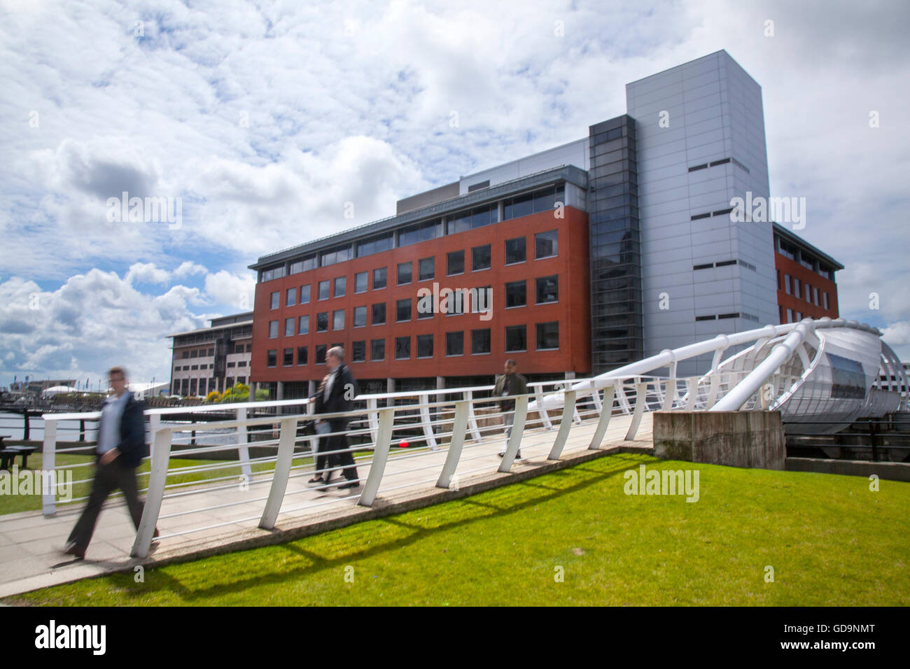Princes Dock bridge and offices on the coastal riverside promenade on ...