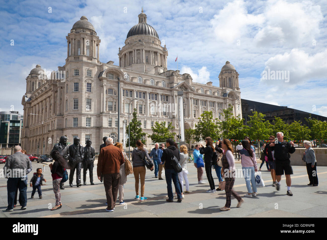 The Fabulous Four Beatles statues on the coastal riverside promenade on ...