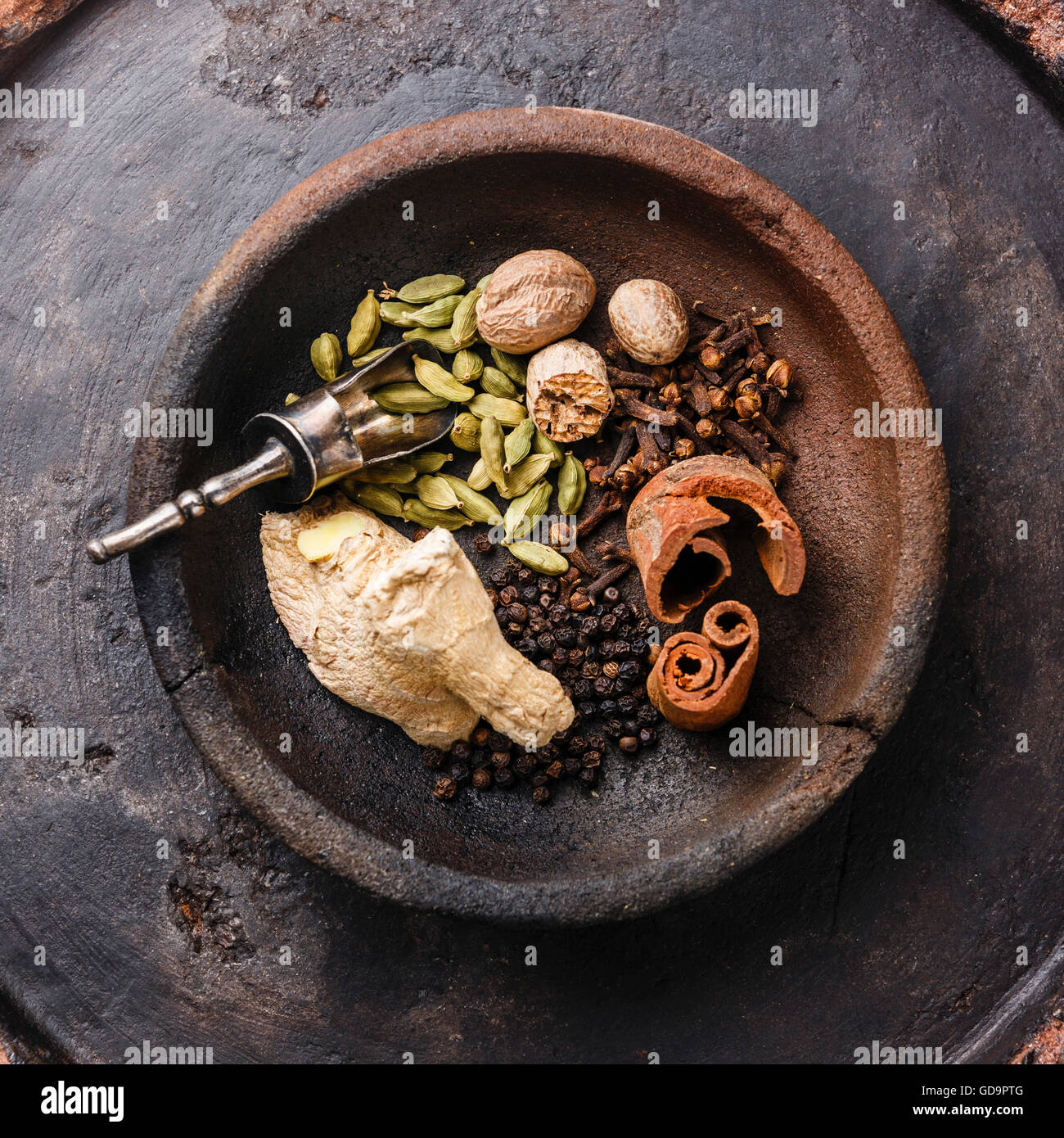 Spices Ingredients for Indian masala tea on dark background Stock Photo ...