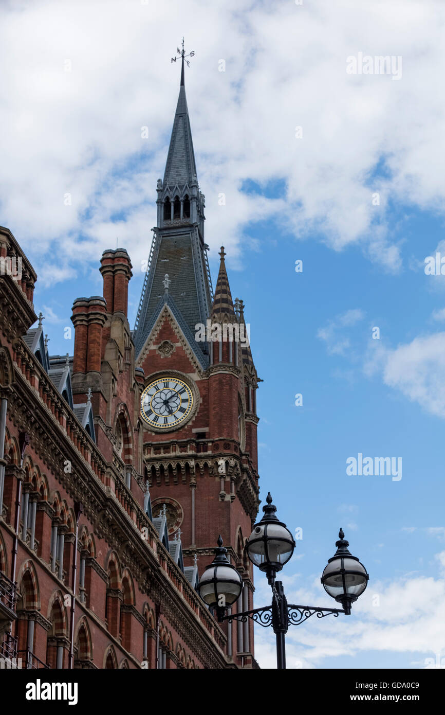 Clock tower and old Victorian street lamps in front of the renovated ...