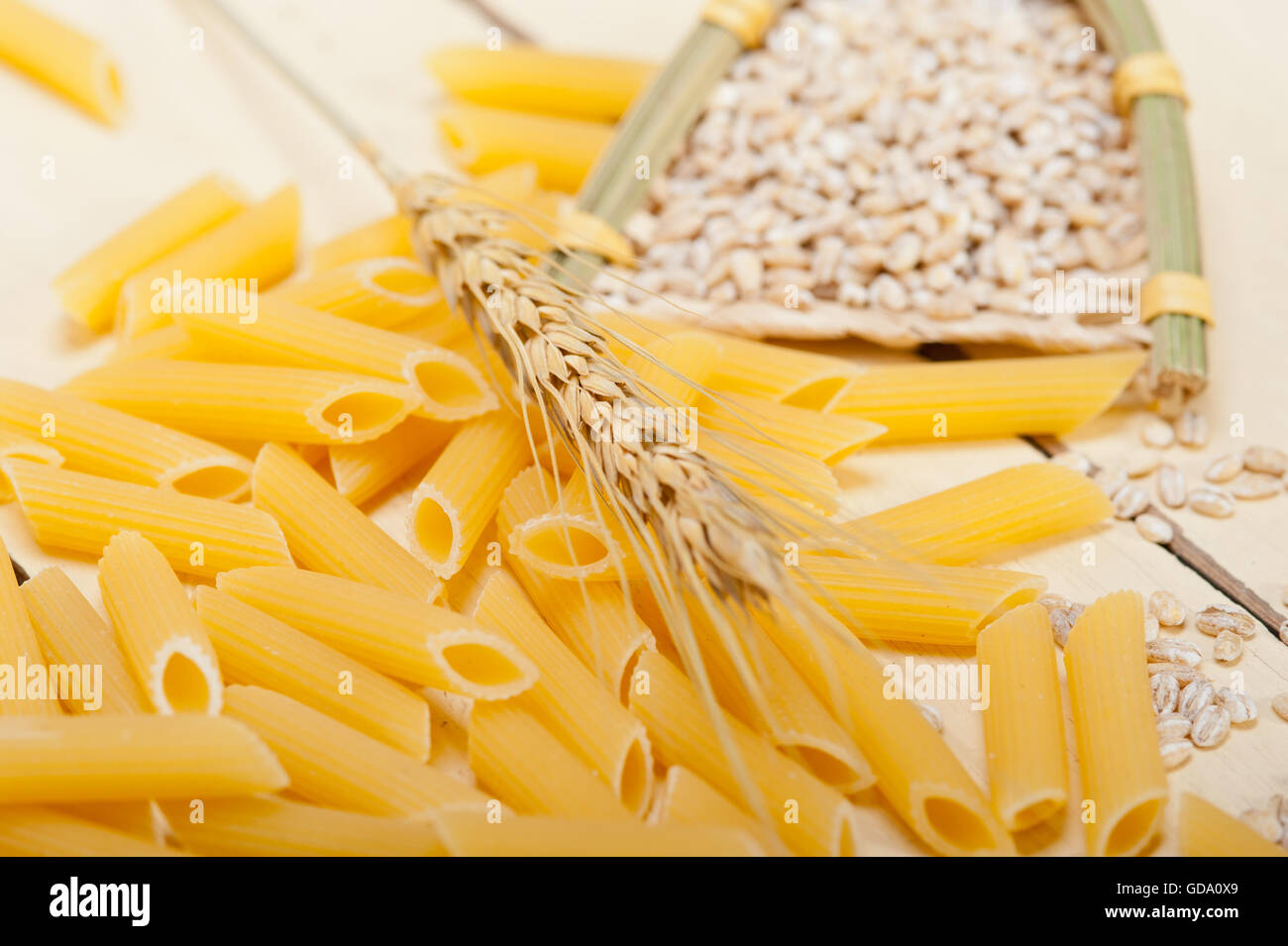 short Italian pasta penne with durum wheat grains Stock Photo - Alamy