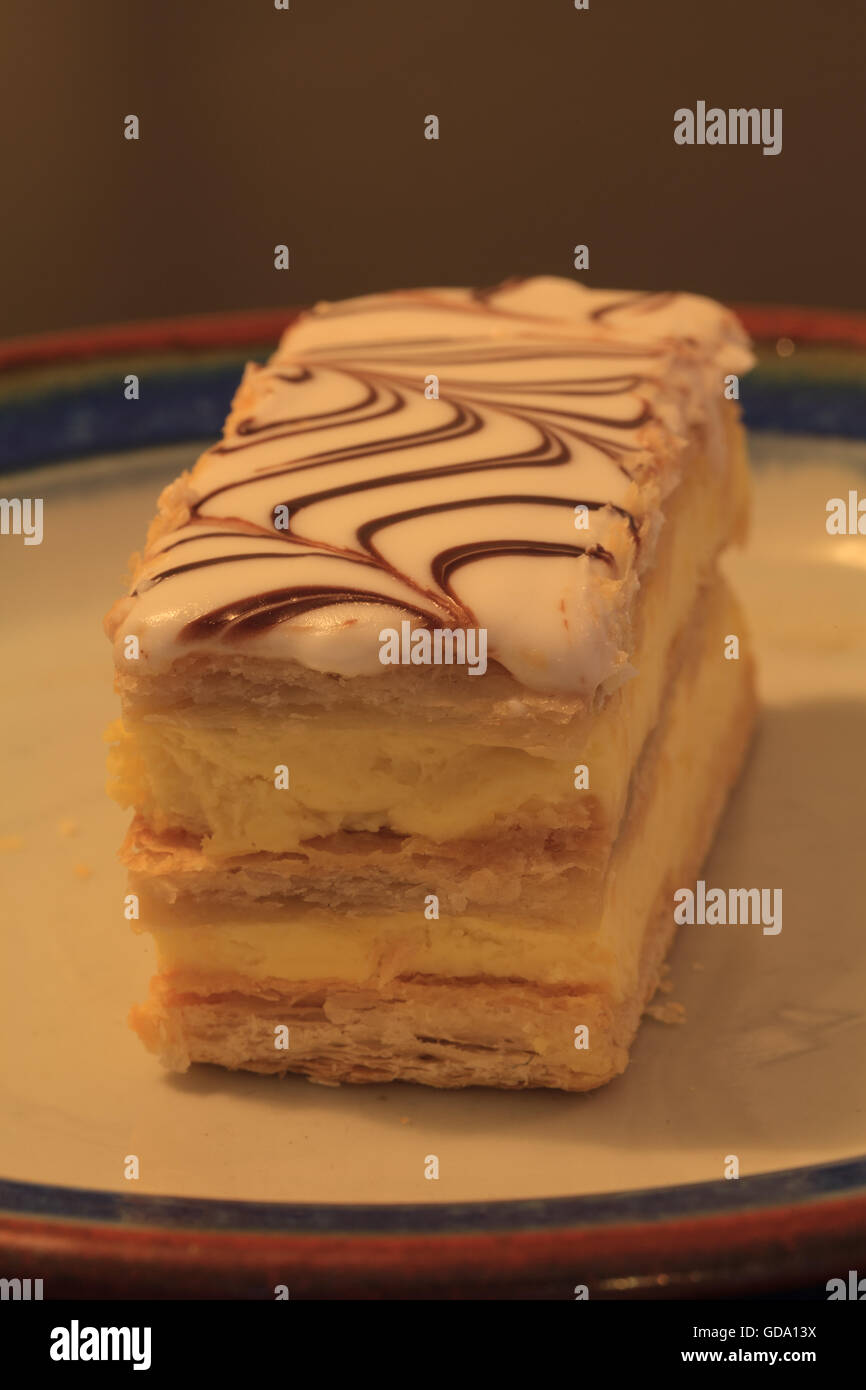 Napoleon Italian dessert pastry on a plate Stock Photo - Alamy