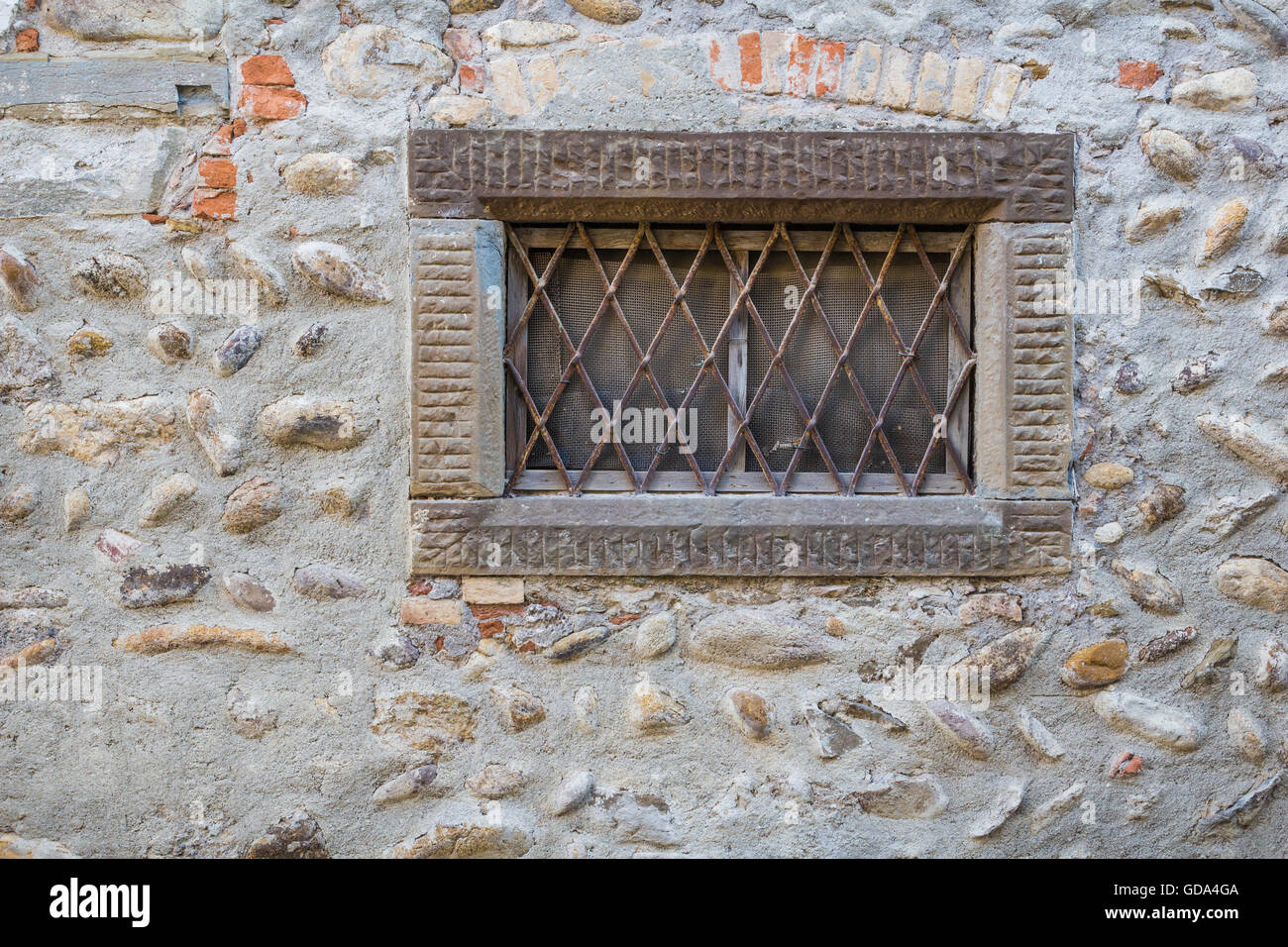 Old stones wall with bars window at the fort Stock Photo - Alamy
