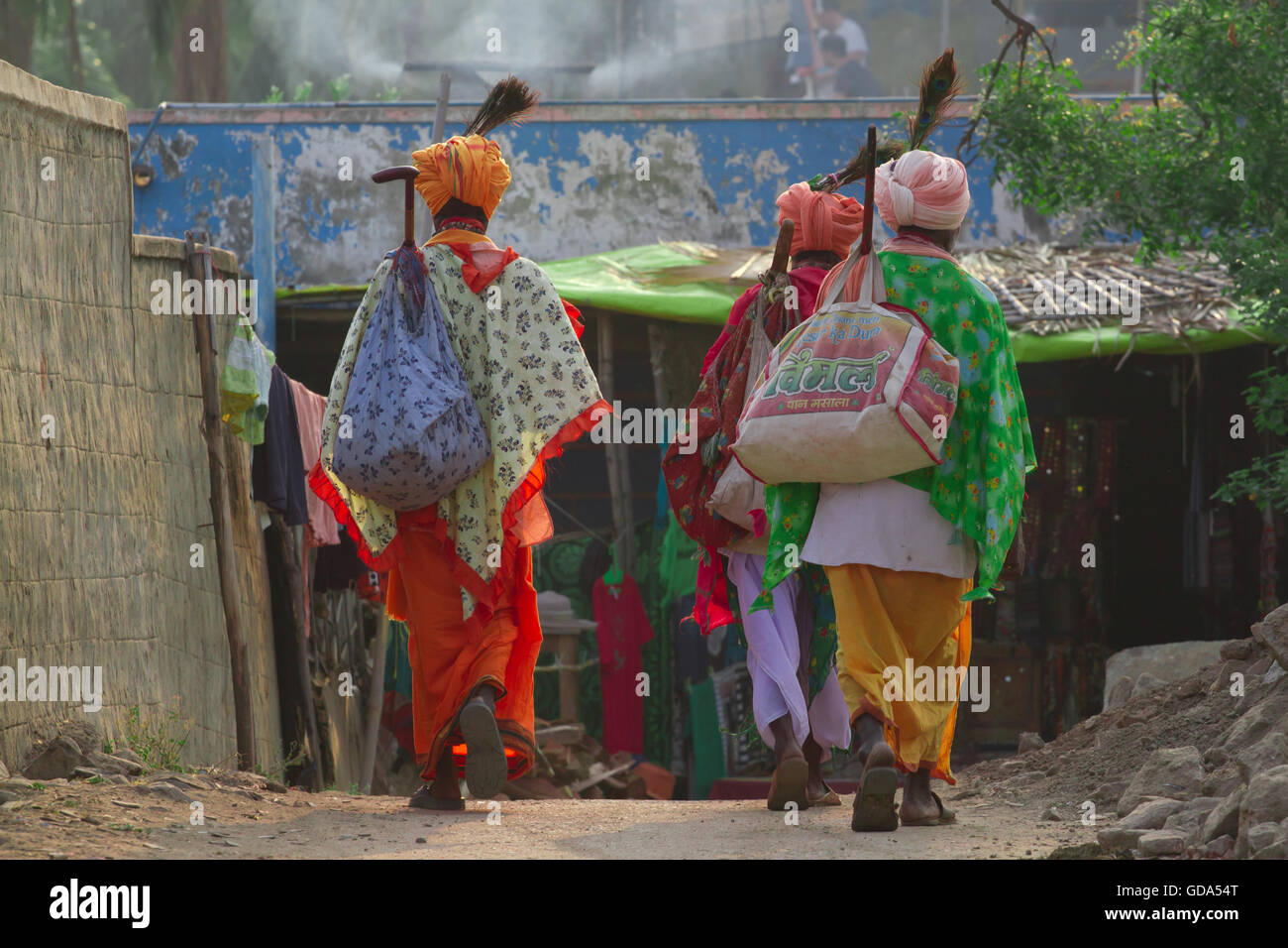HAMPI, KARNATAKA, INDIA, MARCH 24, 2015: Two men in traditional Indian ...