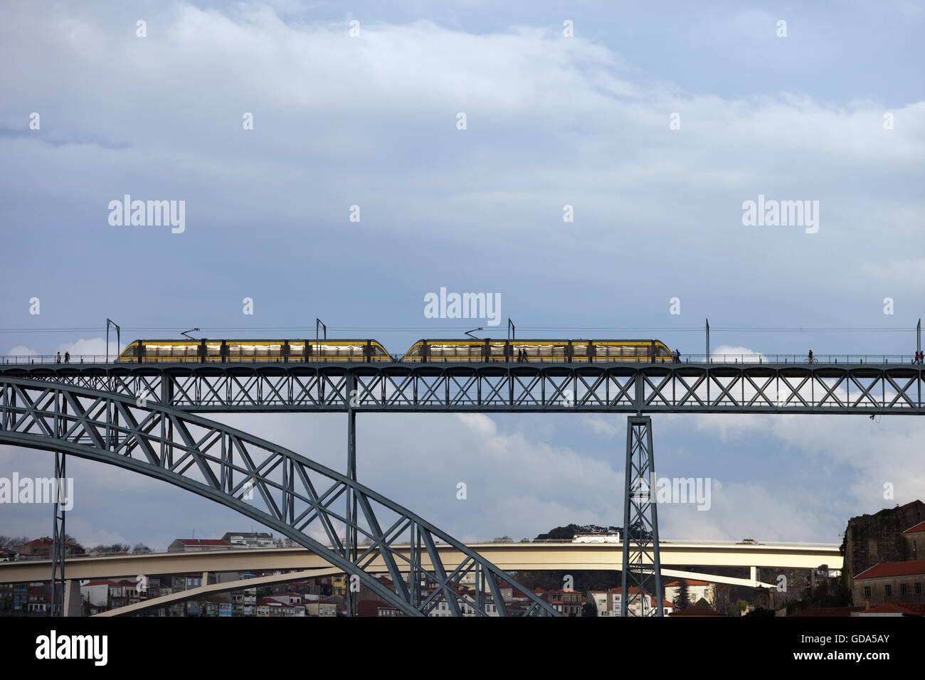 Metro public transport on Dom Luis I Bridge in Porto, Portugal Stock ...