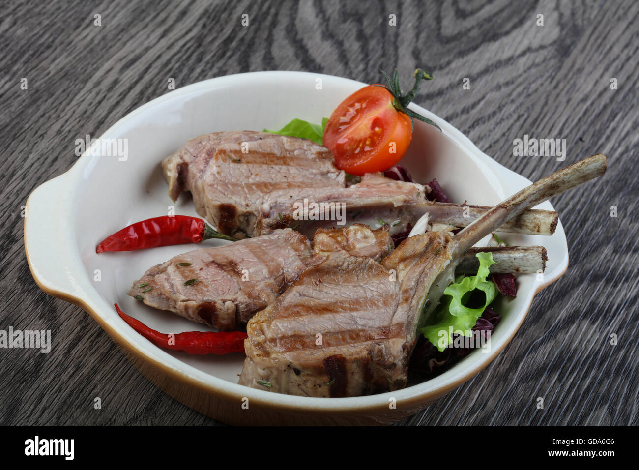 Lamb Frenched Rack grilled rib bone Stock Photo - Alamy
