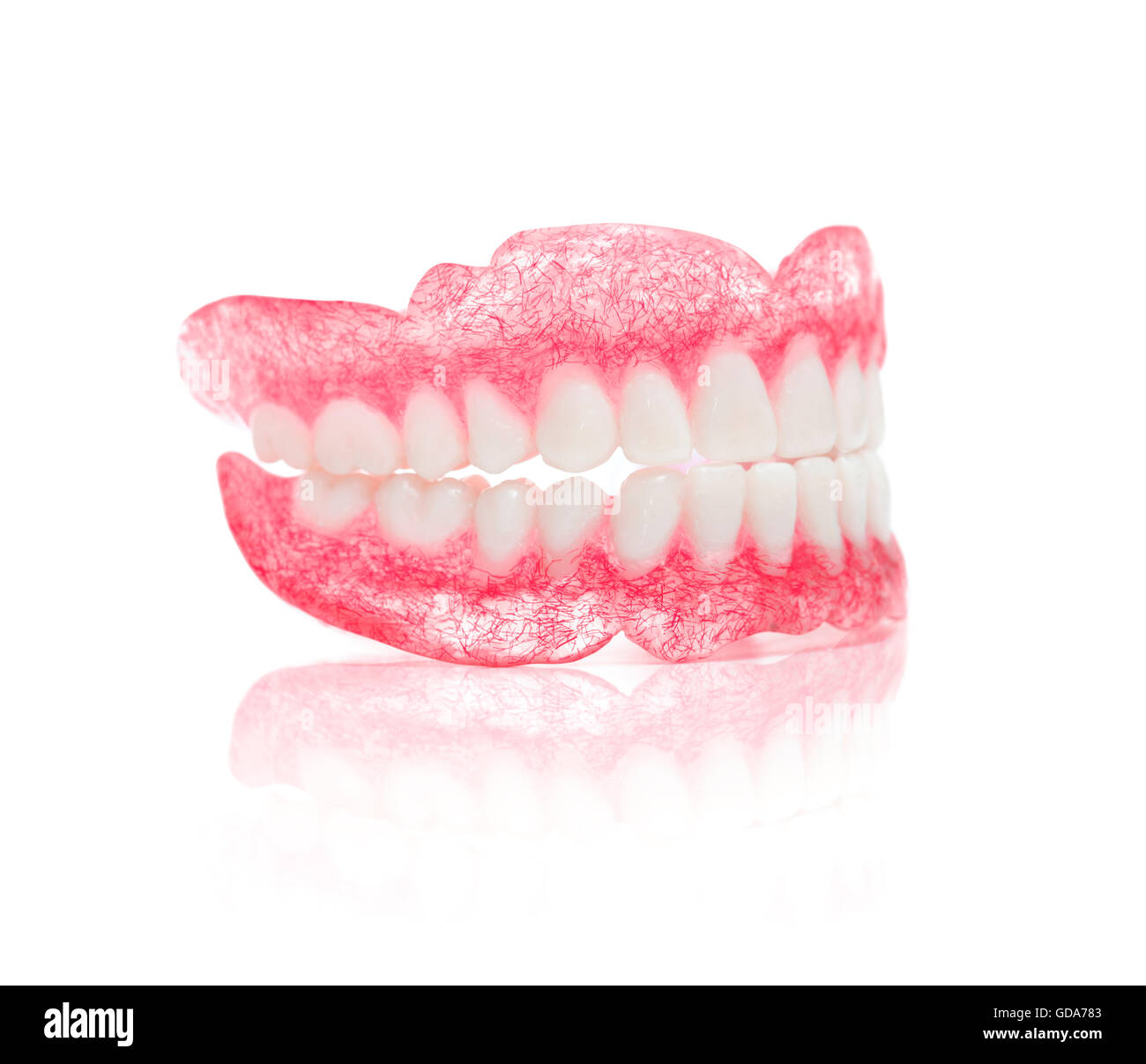 A Set of Dentures Isolated on White Background Stock Photo - Alamy