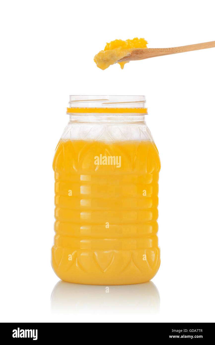 Jar of Pure Indian Ghee with Spoon Isolated on White Background Stock ...