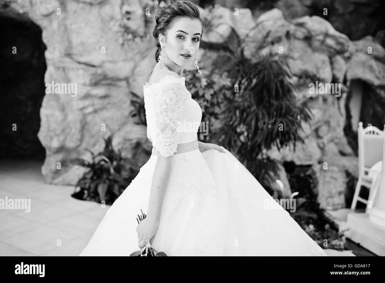 Portrait of back of beautiful bride at wedding hall Stock Photo - Alamy