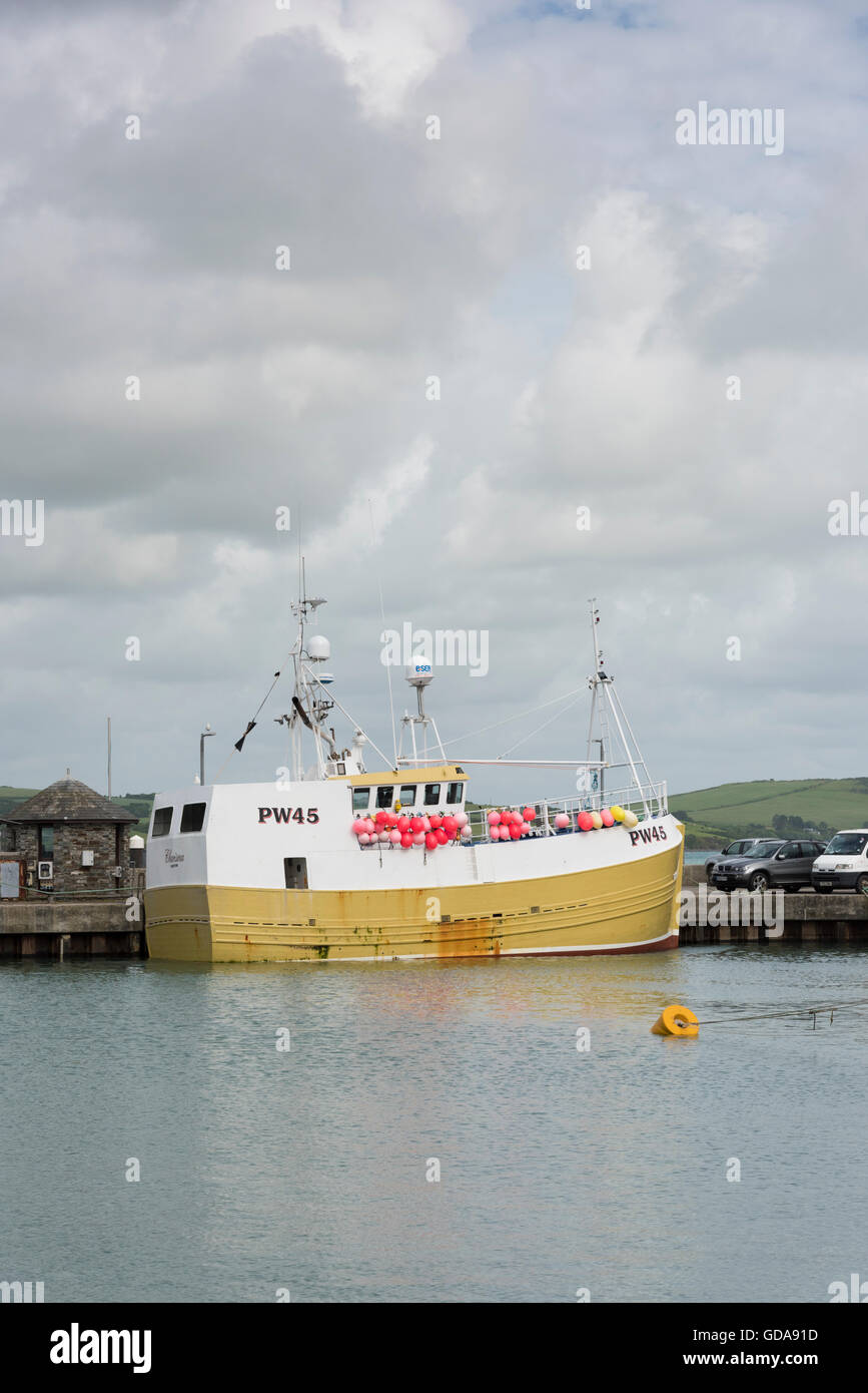 A trawler commercial fishing boat moored in the harbour at Padstow ...