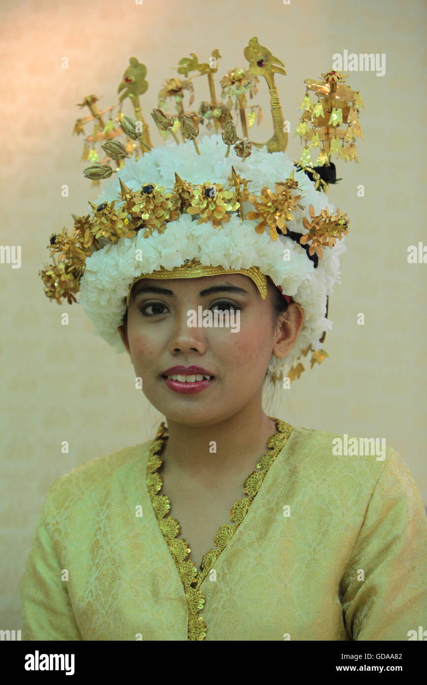 a women in traditional dress in the city of Bandar seri Begawan in the ...