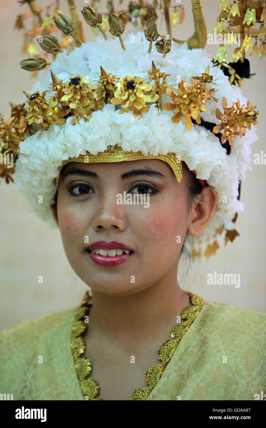 a women in traditional dress in the city of Bandar seri Begawan in the ...