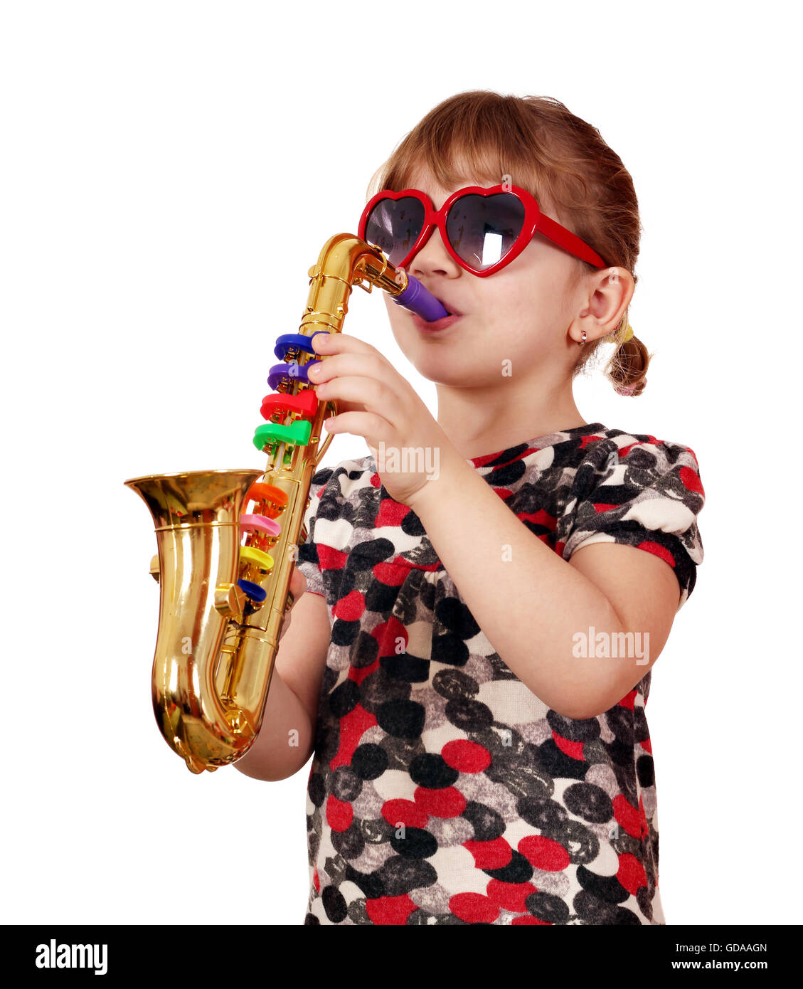 little girl play saxophone Stock Photo - Alamy