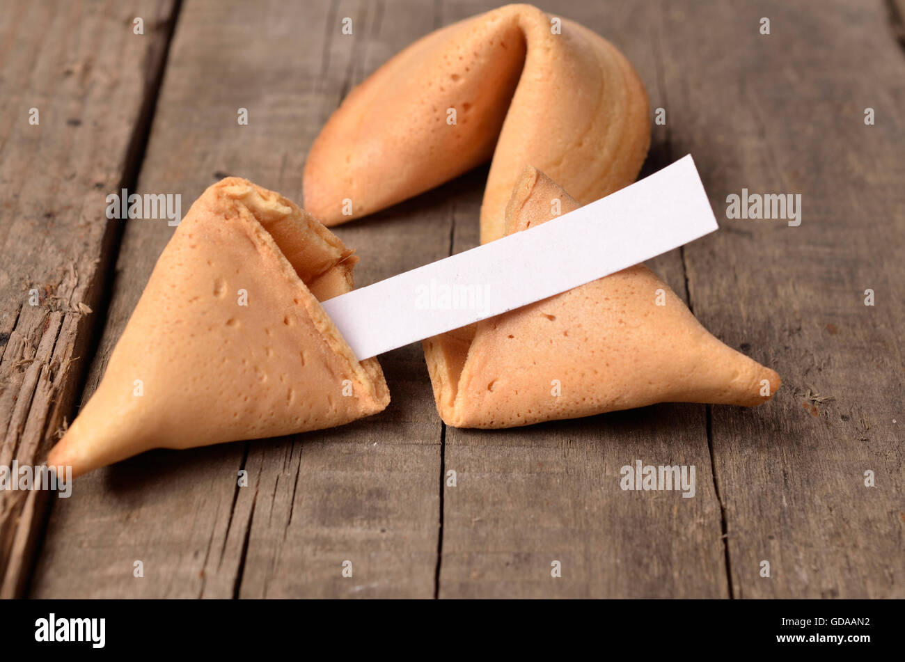 Open fortune cookie with a blank paper inside, space for your text ...