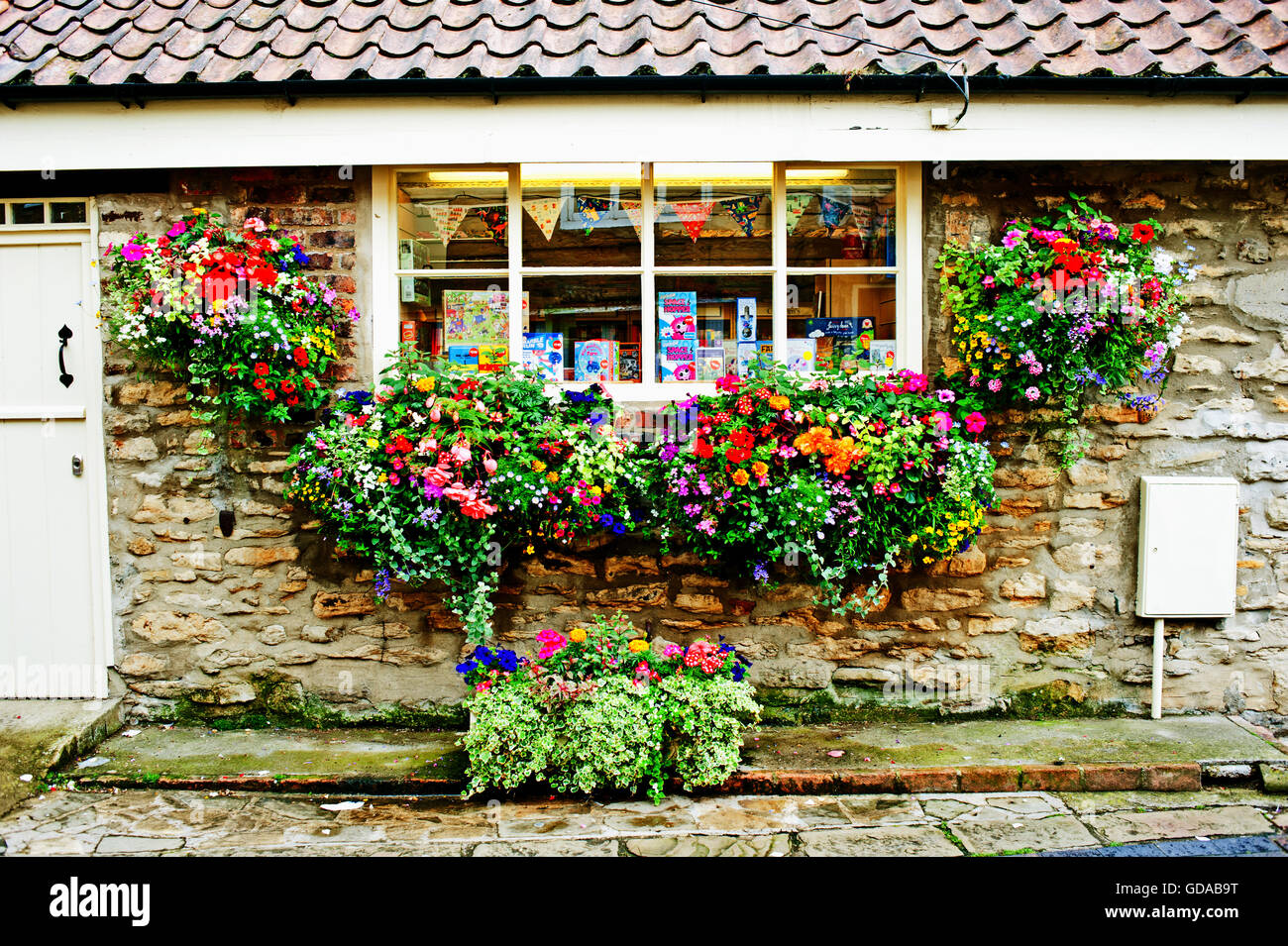 Flower baskets, Helmsley, North Yorkshire Stock Photo - Alamy