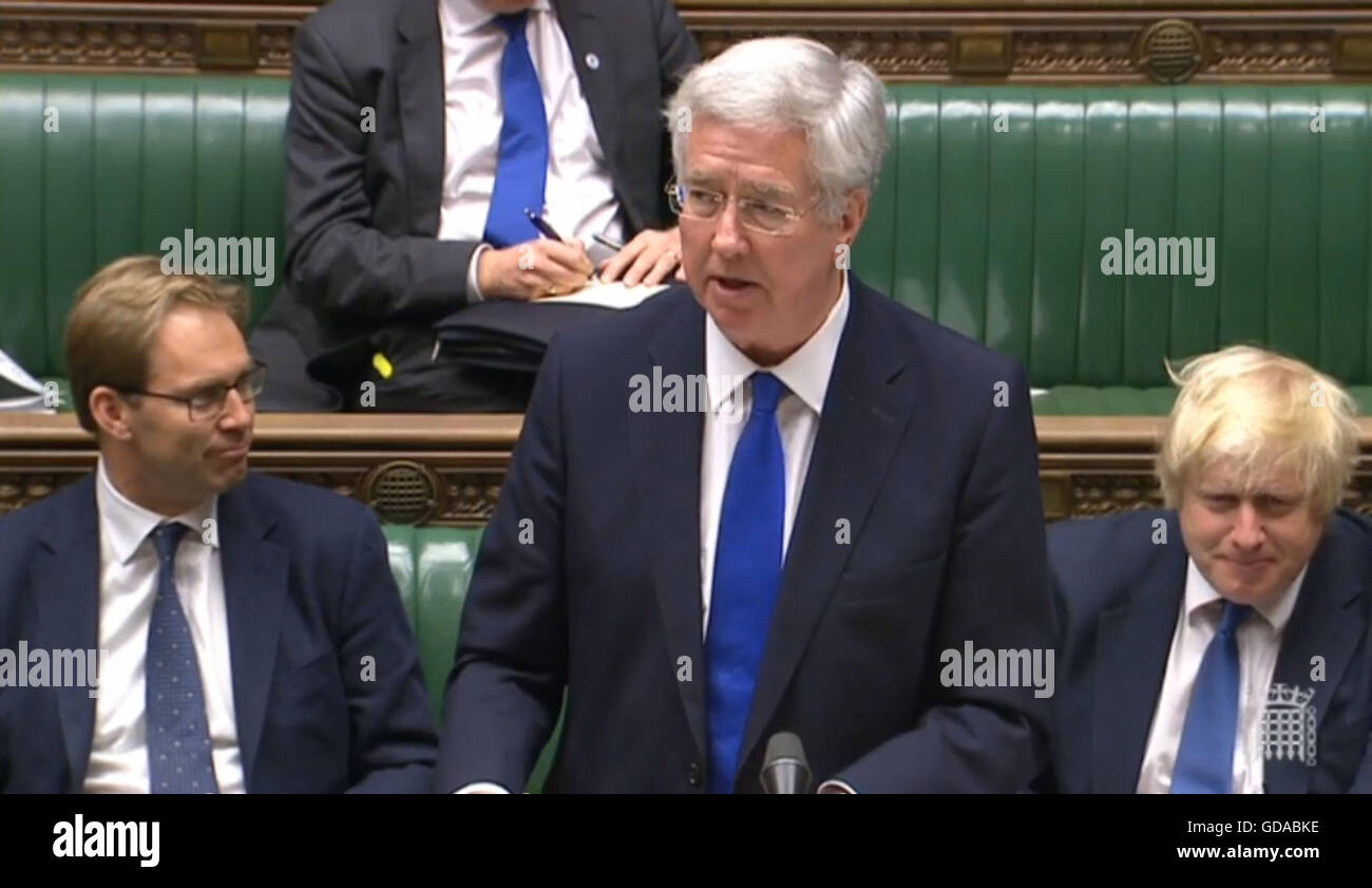 Foreign Secretary Boris Johnson (right) sits on the front bench in the ...
