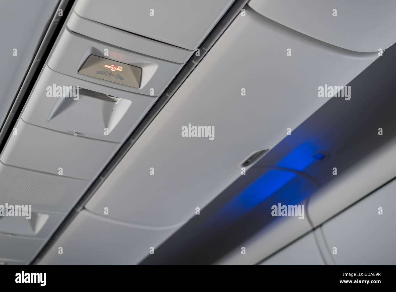In the airplane cabin with a warning sign, warning signs in the ...