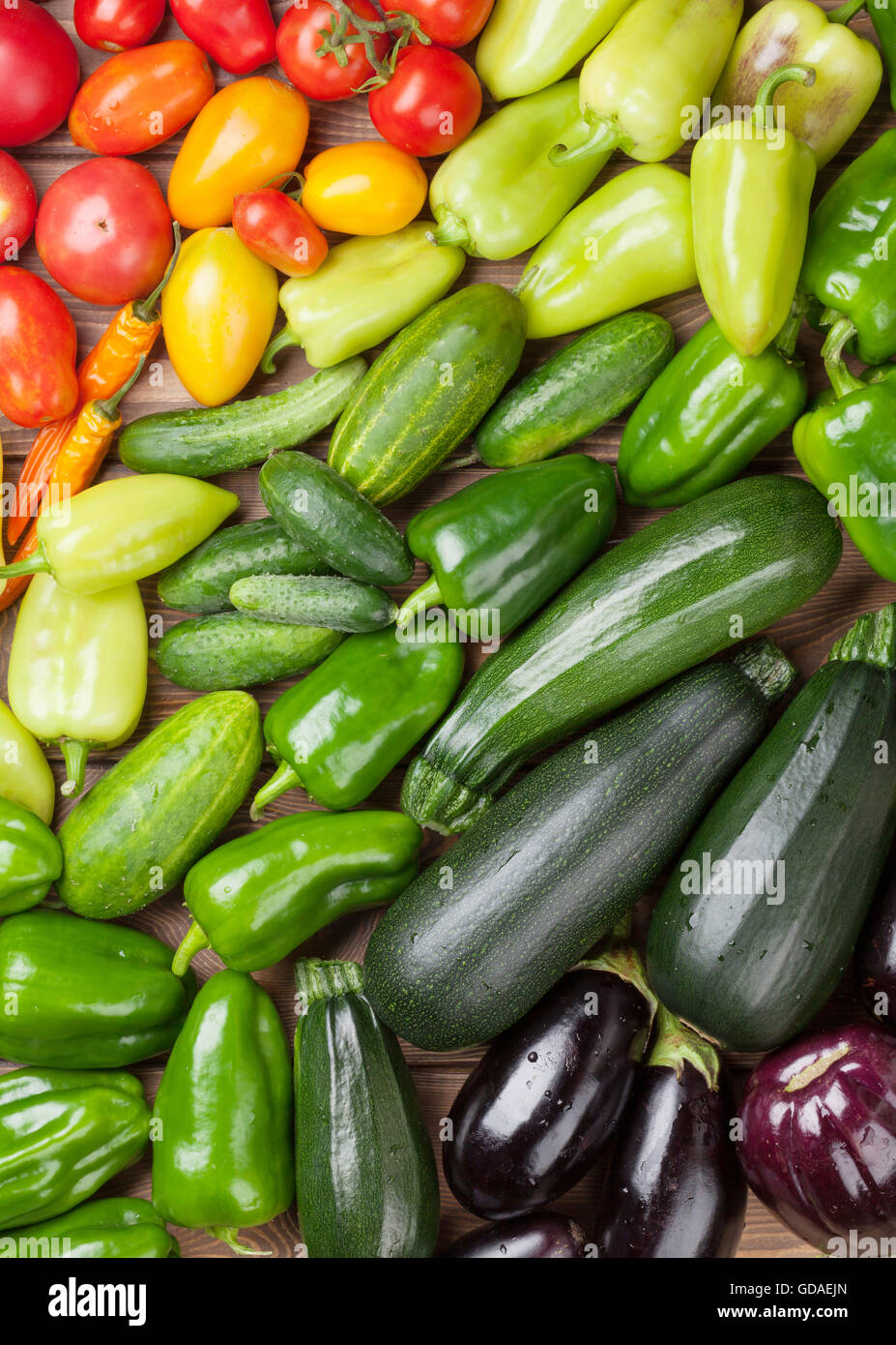 Fresh farmers garden vegetables on wooden table. Top view Stock Photo ...