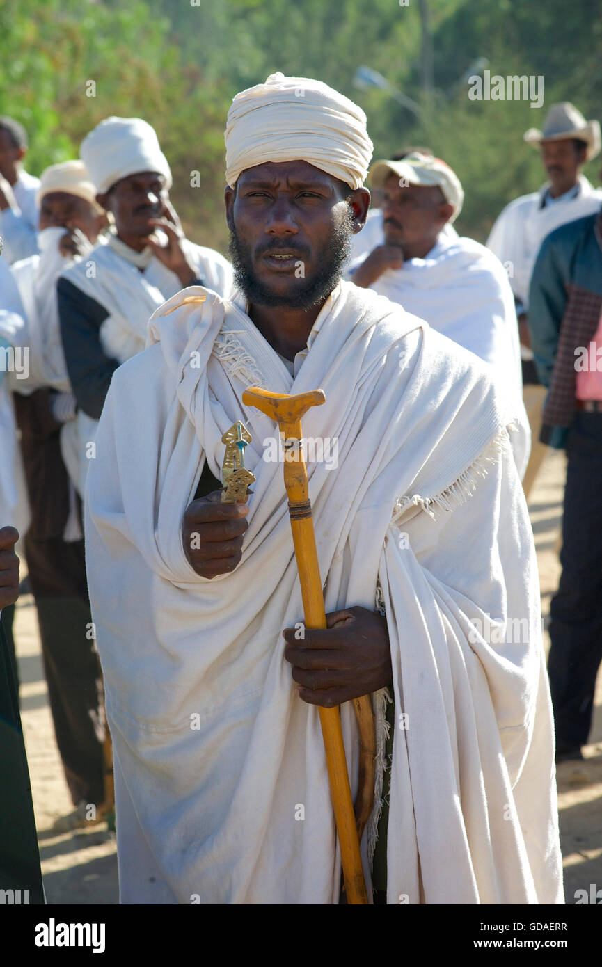 Ethiopian priest with cane and sistrum. Palm Sunday Christian religious ...