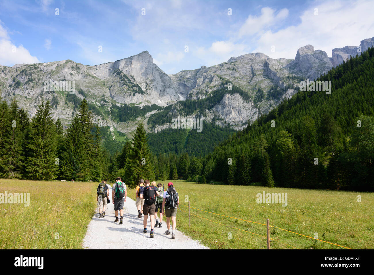 Hochschwab Mountains: Hikers in front of the mountains of the ...