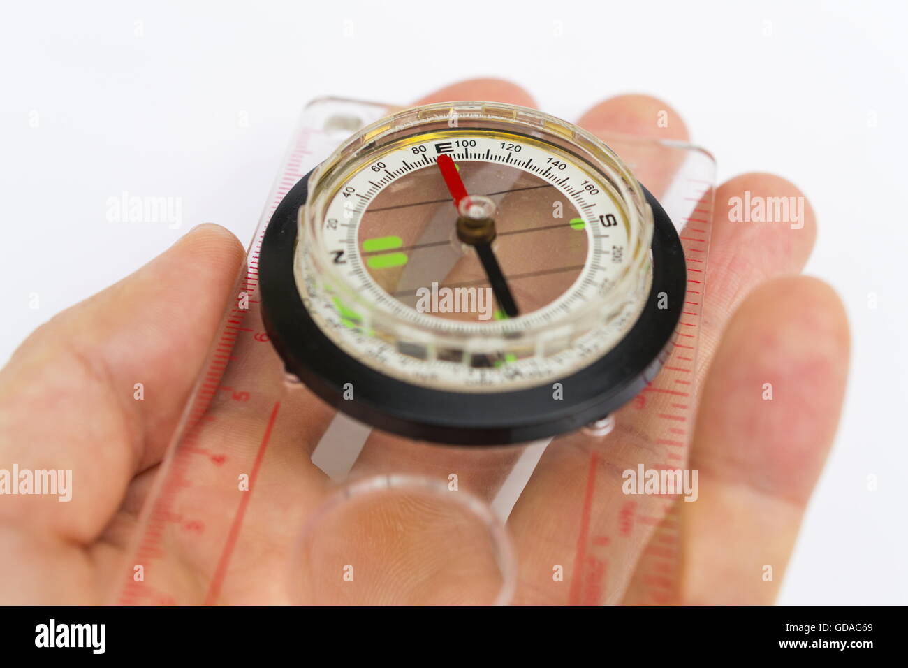 Detail shot of glass compass isolated on white background Stock Photo ...