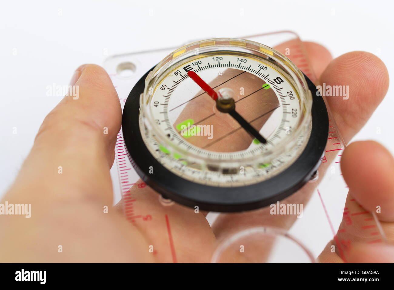 Detail shot of glass compass isolated on white background Stock Photo ...