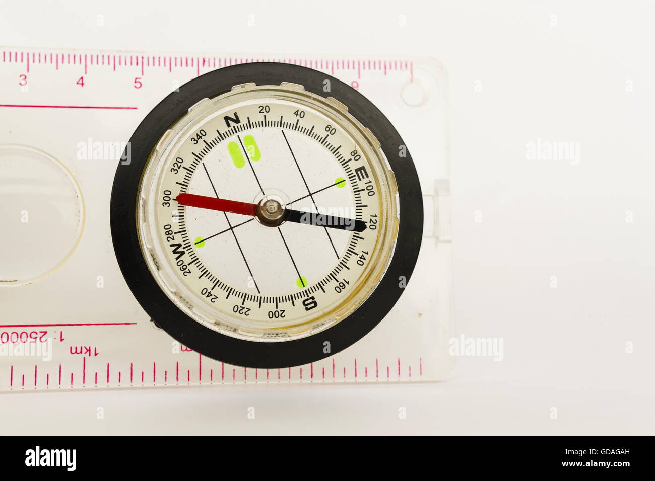 Detail shot of glass compass isolated on white background Stock Photo ...