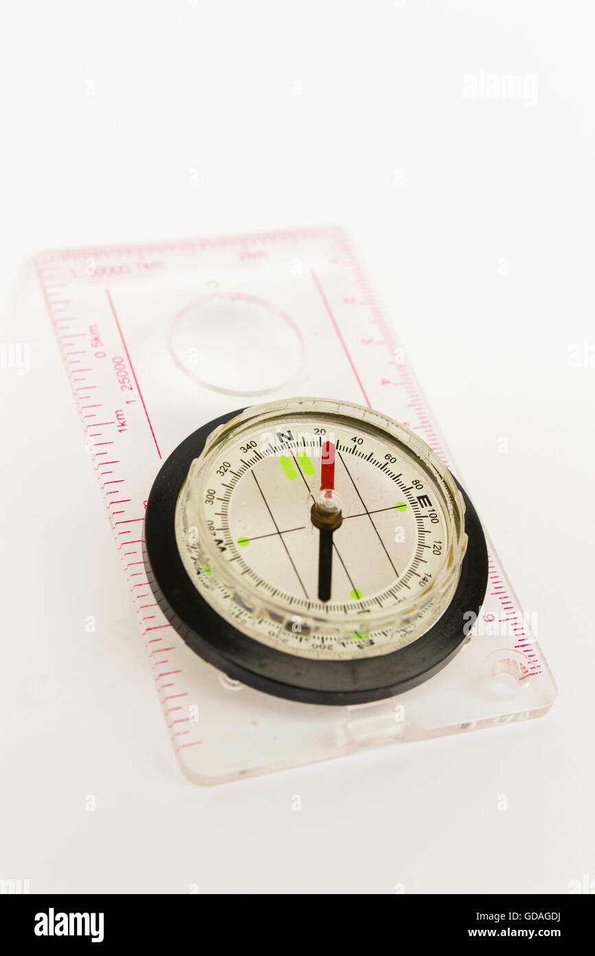 Detail shot of glass compass isolated on white background Stock Photo ...